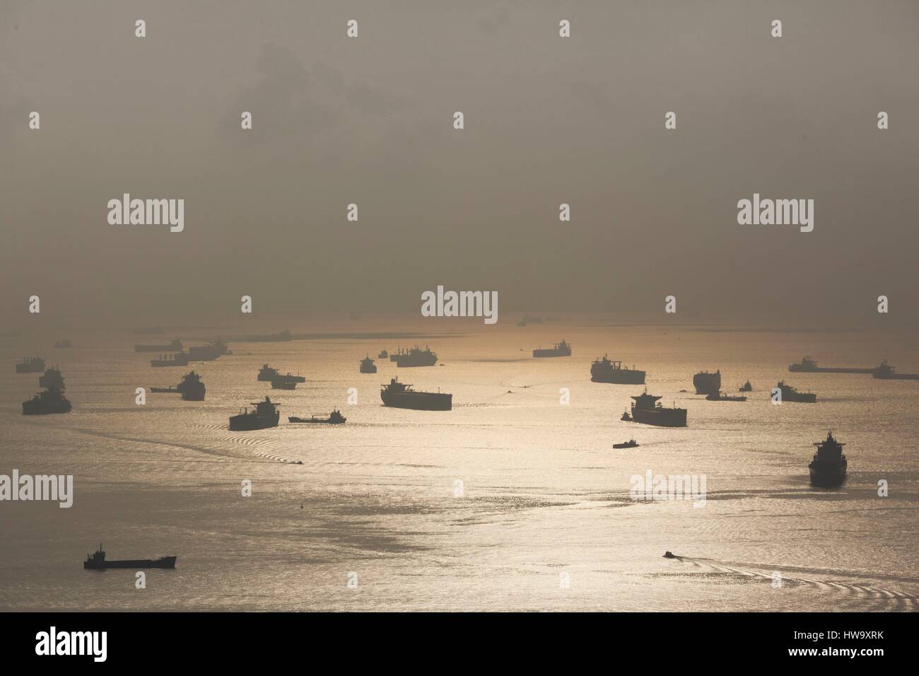 Singapore, elevated view of the Straits of Singapore with ships, dawn ...