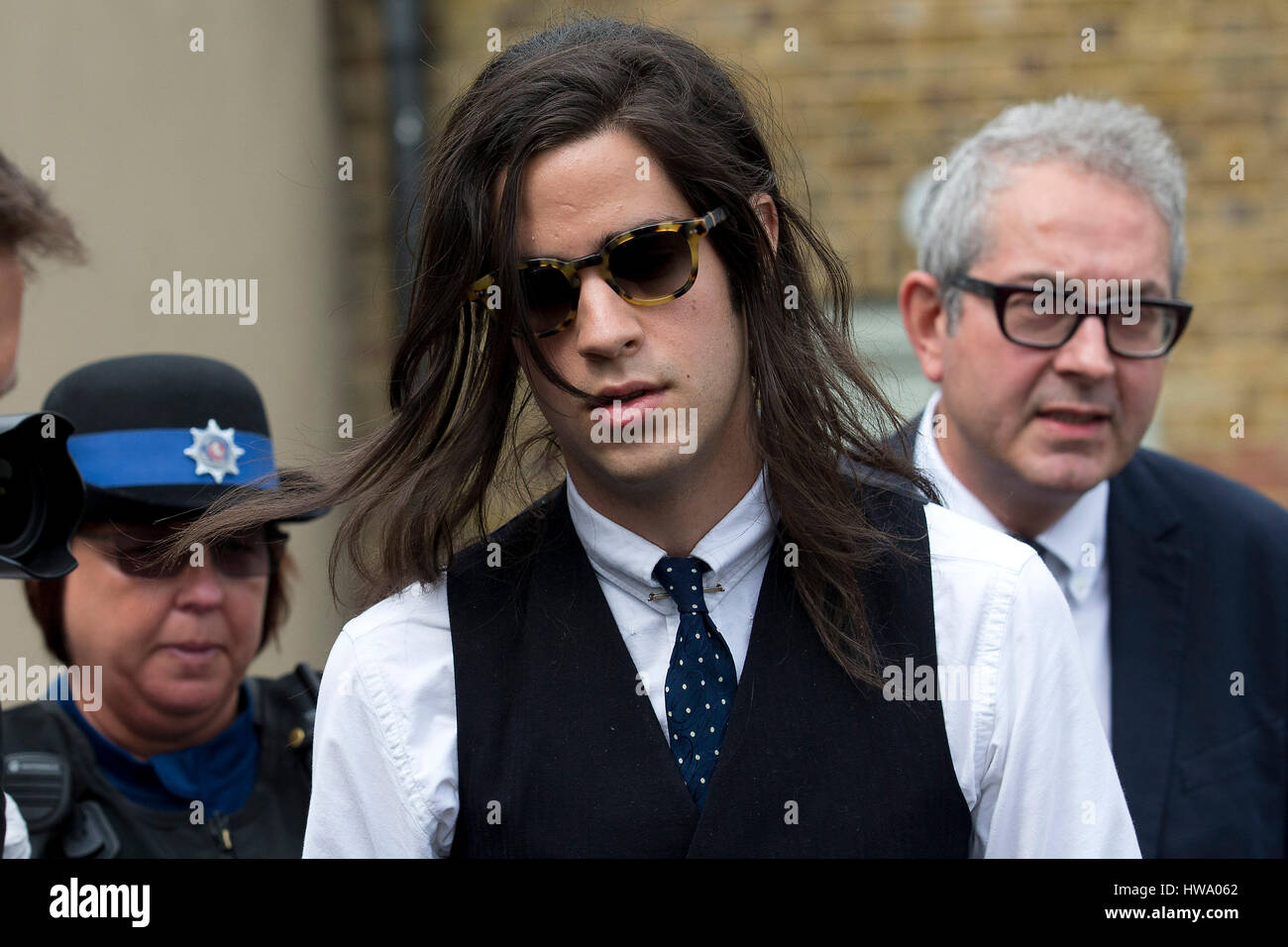 Thomas Cohen leaves after attending the inquest into the death of his ...