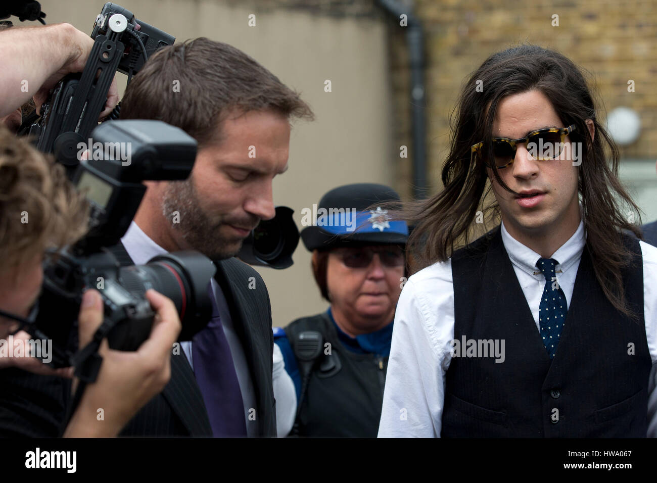 Thomas Cohen leaves after attending the inquest into the death of his ...