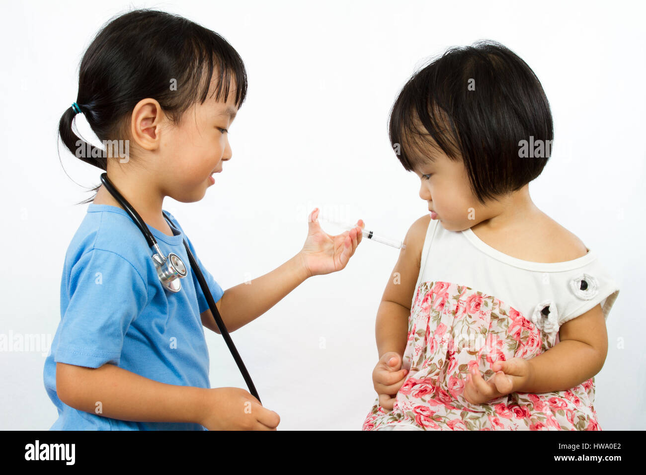 Asian Little Chinese Girls Playing as Doctor and Patient isolated on ...