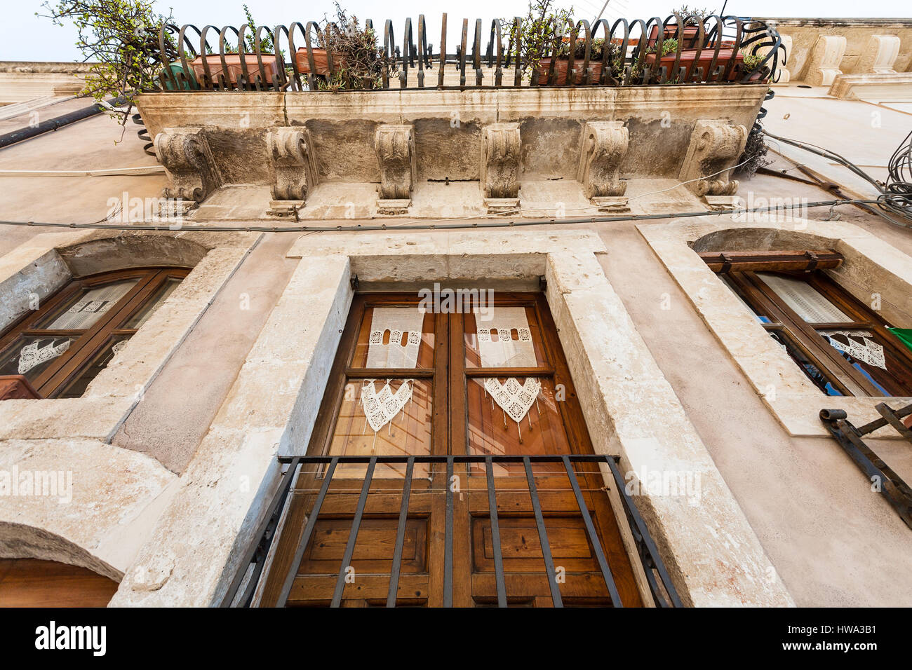 travel to Italy - facade of baroque style urban house in syracuse city ...