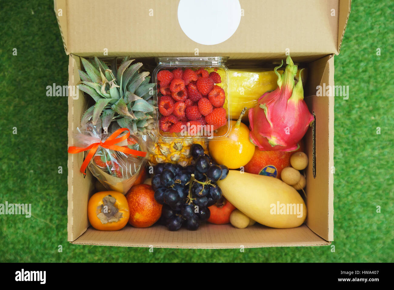 Fresh fruit in a cardboard box Stock Photo - Alamy