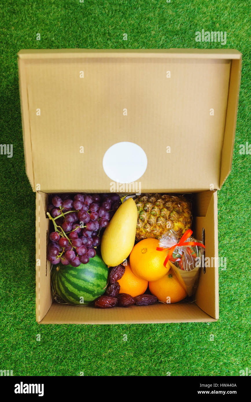 Fresh fruit in a cardboard box Stock Photo - Alamy