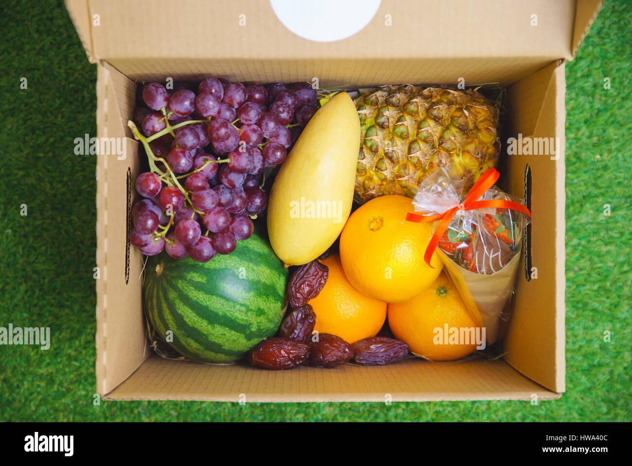 Fresh fruit in a cardboard box Stock Photo - Alamy