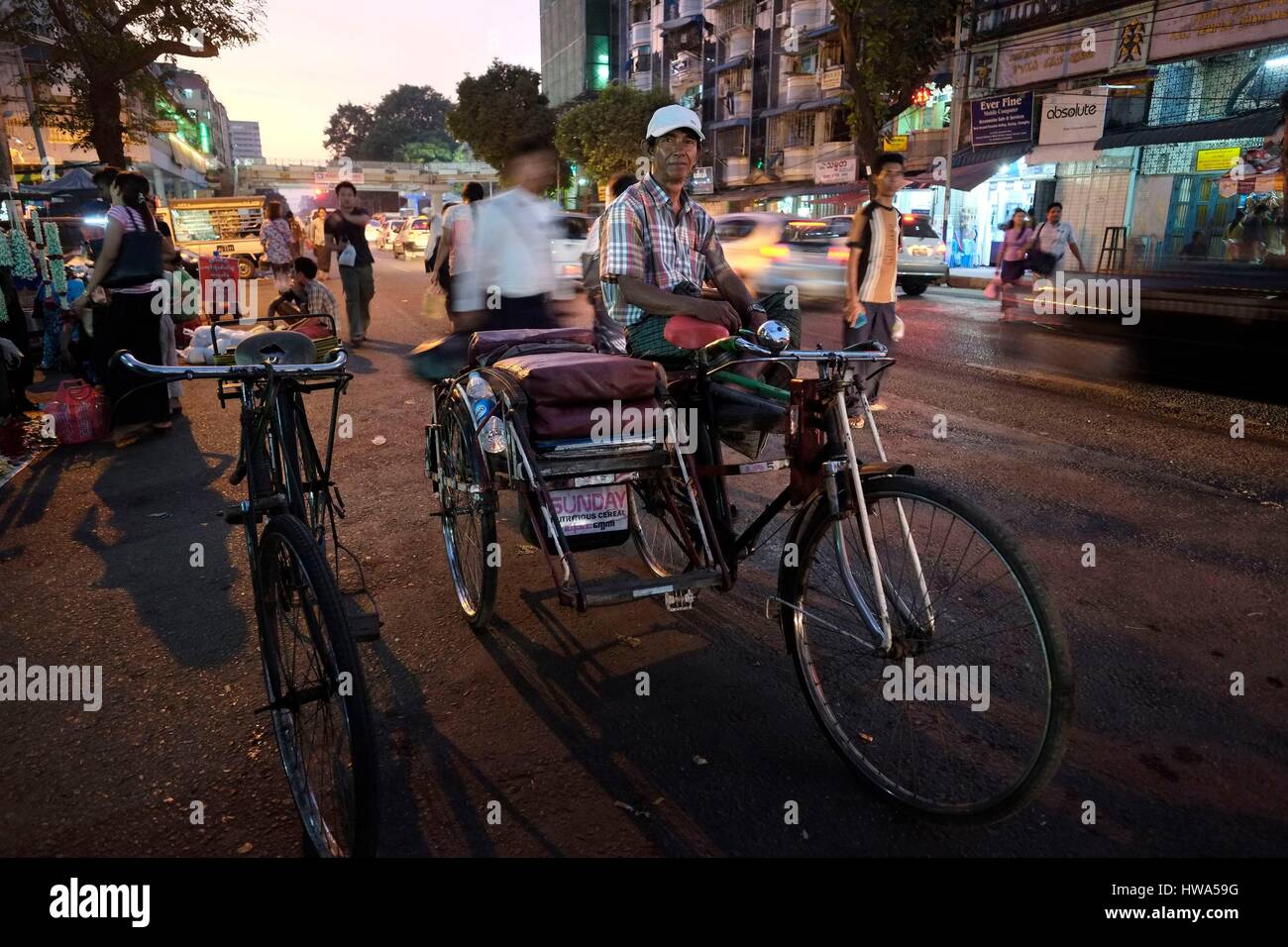 Bicycle rickshaw yangon myanmar hi-res stock photography and images - Alamy