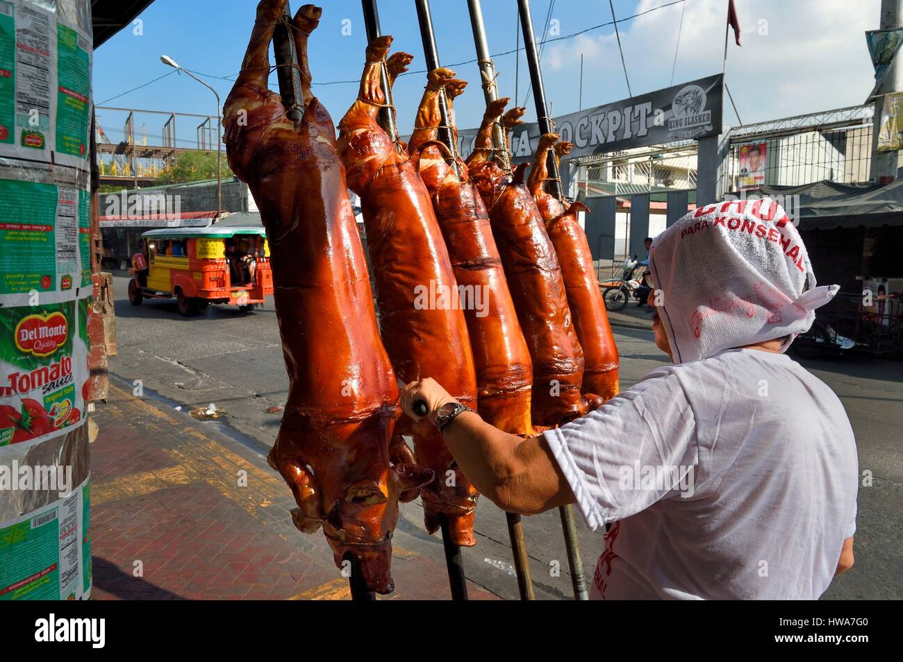Philippines, Luzon island, Manila, La Loma district, spit-roasted ...