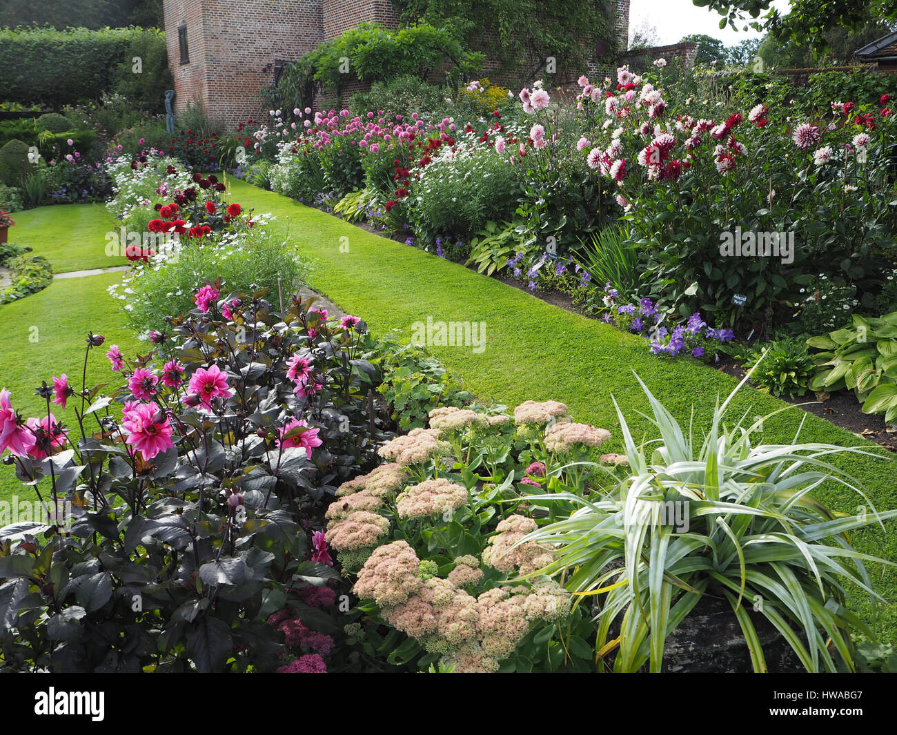 Chenies Manor garden, Buckinghamshire. The sunken garden dahlia display ...