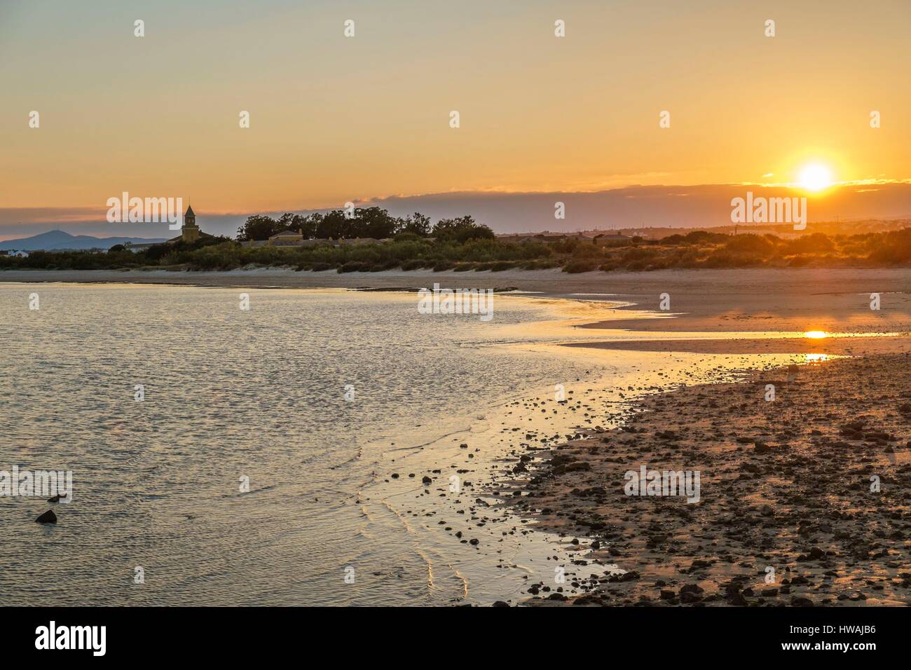 Portugal, Algarve region, Tavira, Ria Formosa Natural Park at sunset ...