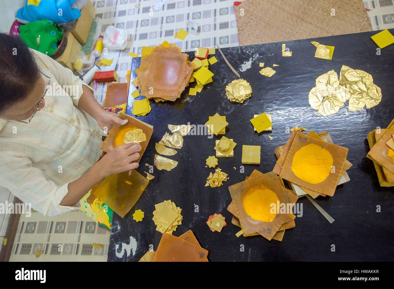 Myanmar, Mandalay State, Mandalay, gold leaf making workshop Stock ...