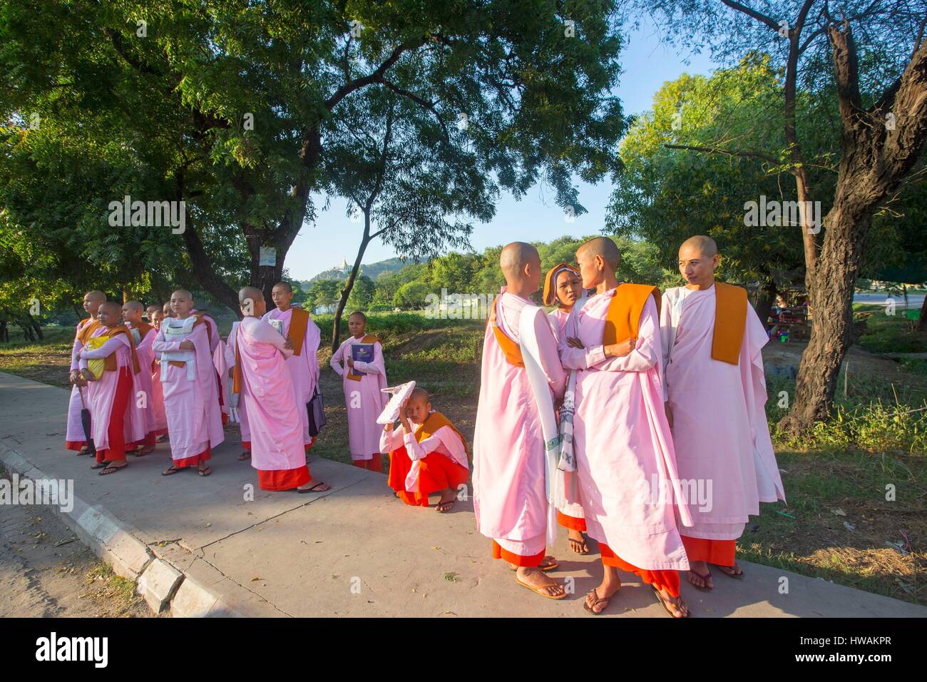 Myanmar, Mandalay State, Mandalay, group of nuns in town Stock Photo ...