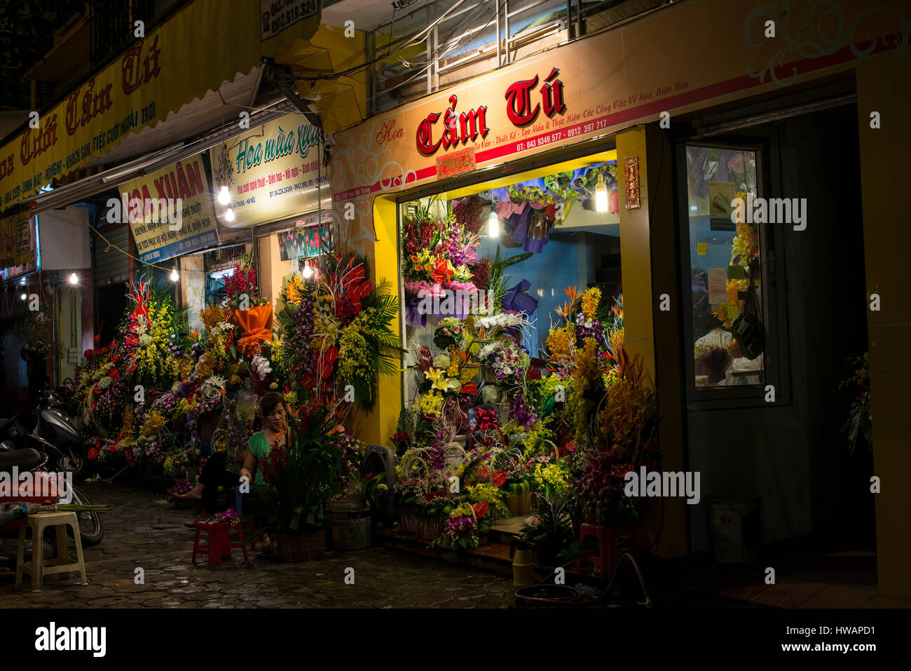Saigon flower shops at night Stock Photo - Alamy