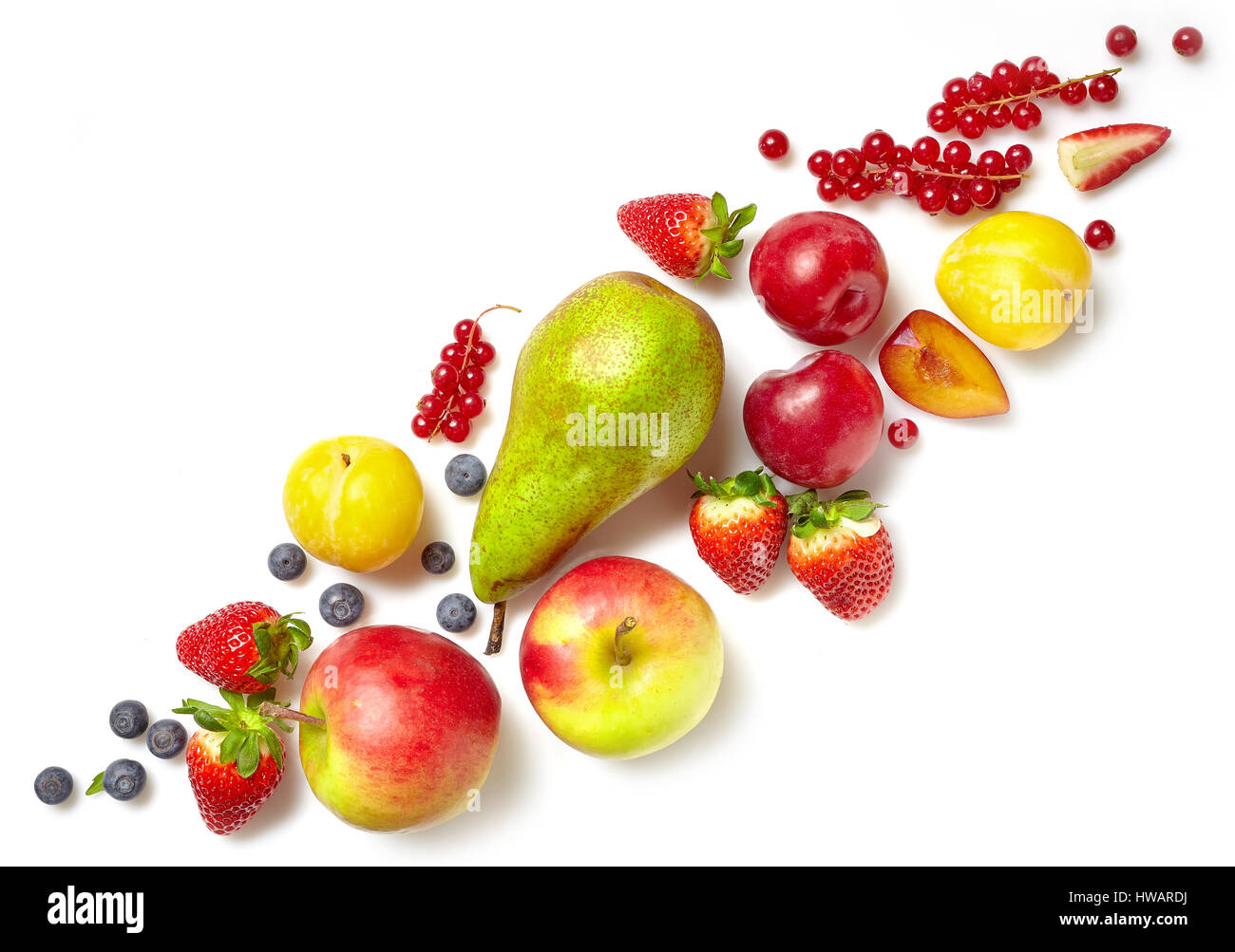 diagonal composition of various fruits and berries isolated on white ...