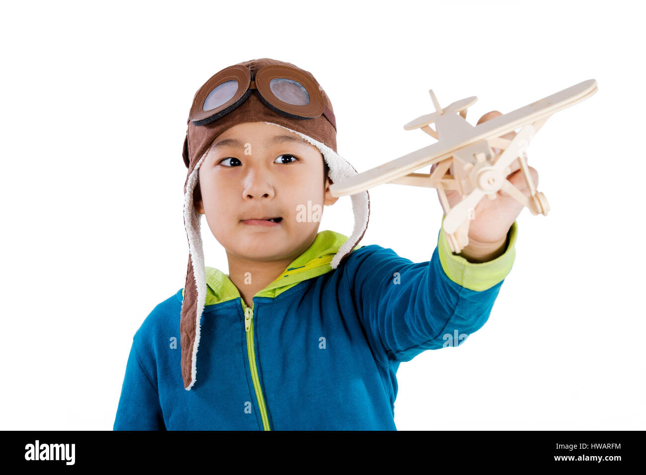 Asian Chinese Boy Playing with Wooden Airplane in isolated White ...