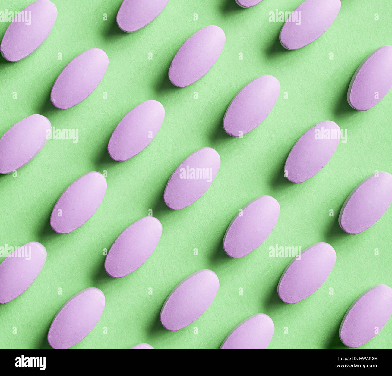 Purple pills hi-res stock photography and images - Alamy