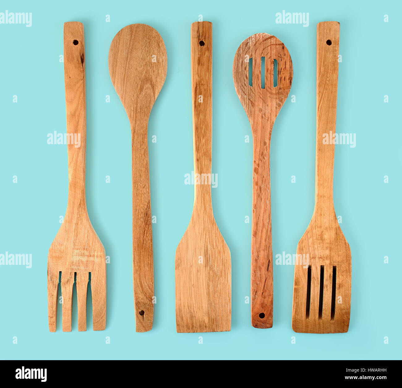 kitchen utensil on a blue background Stock Photo - Alamy
