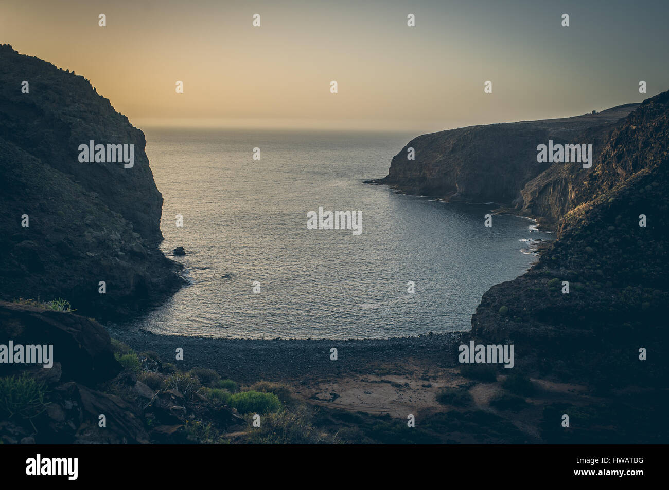 Golden sunset in the secret beach of Gran Canaria Stock Photo - Alamy