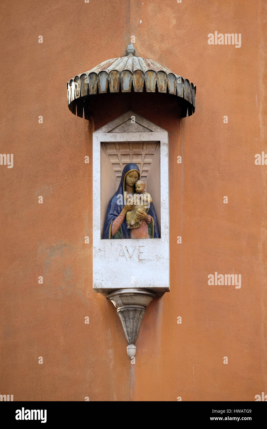 Ave Maria Image of Virgin Mary with baby Jesus on the facade of a ...