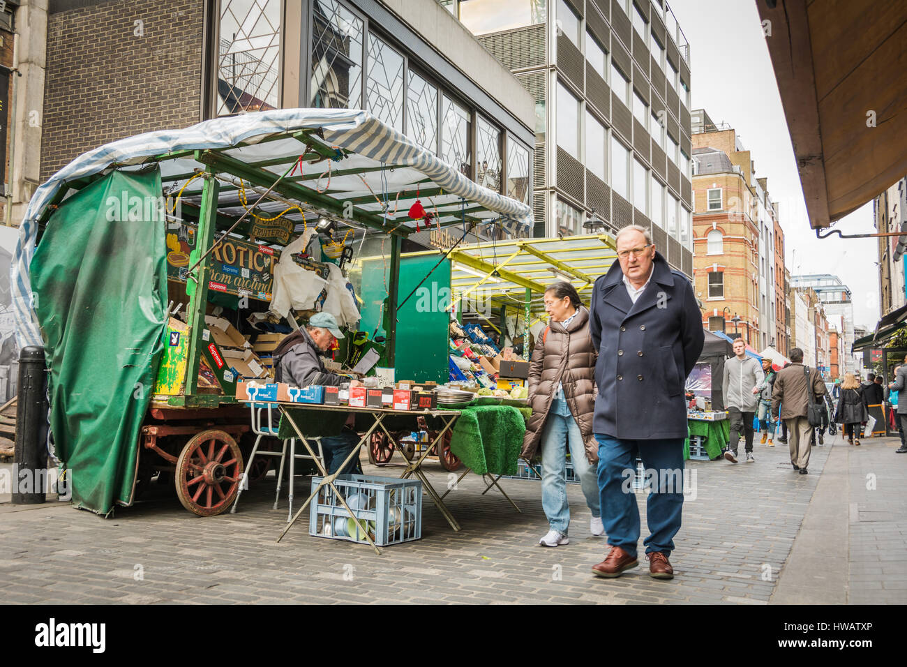 A market trader and stall and the remains of 250-year-old Berwick ...