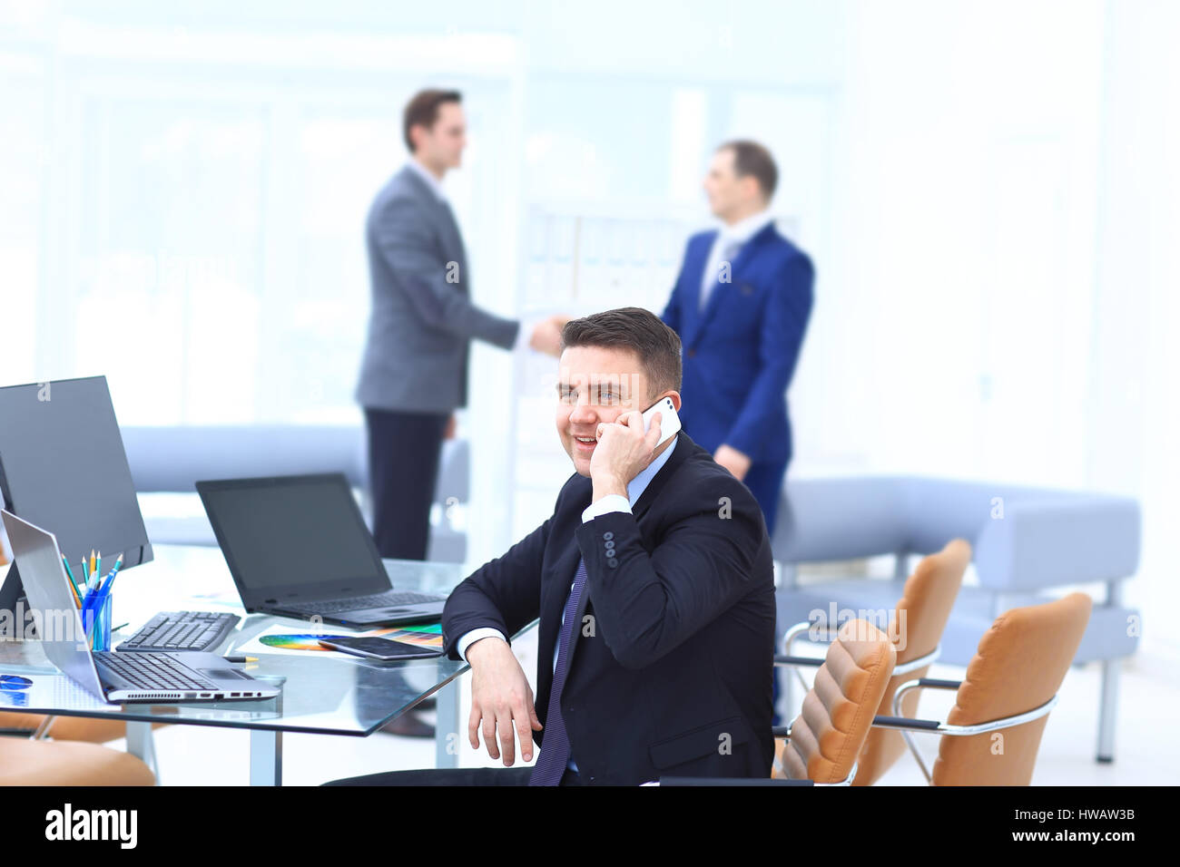 Employee looking at computer monitor during working day in office Stock ...
