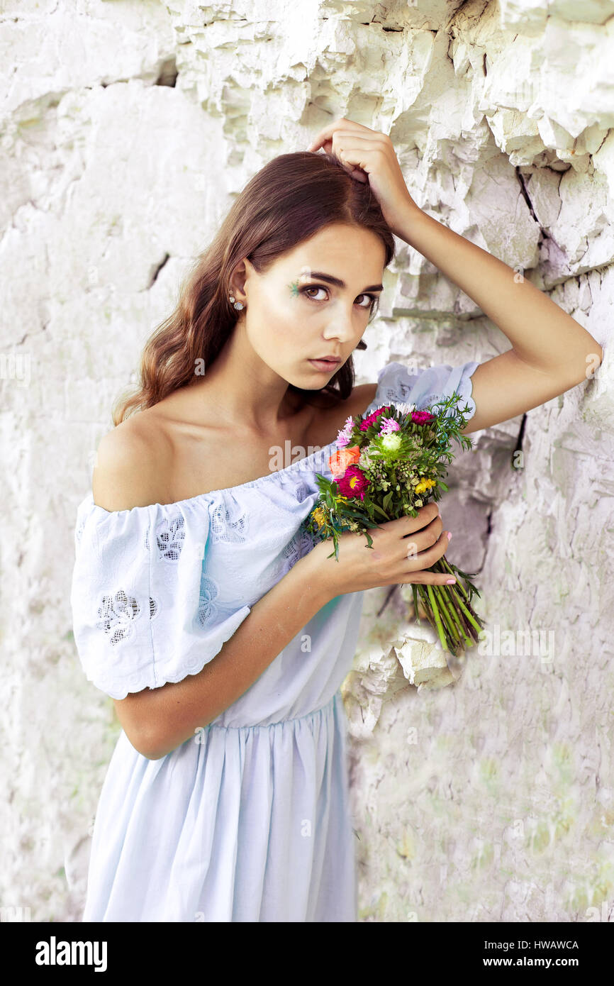 Beautiful girl with flowers Stock Photo - Alamy