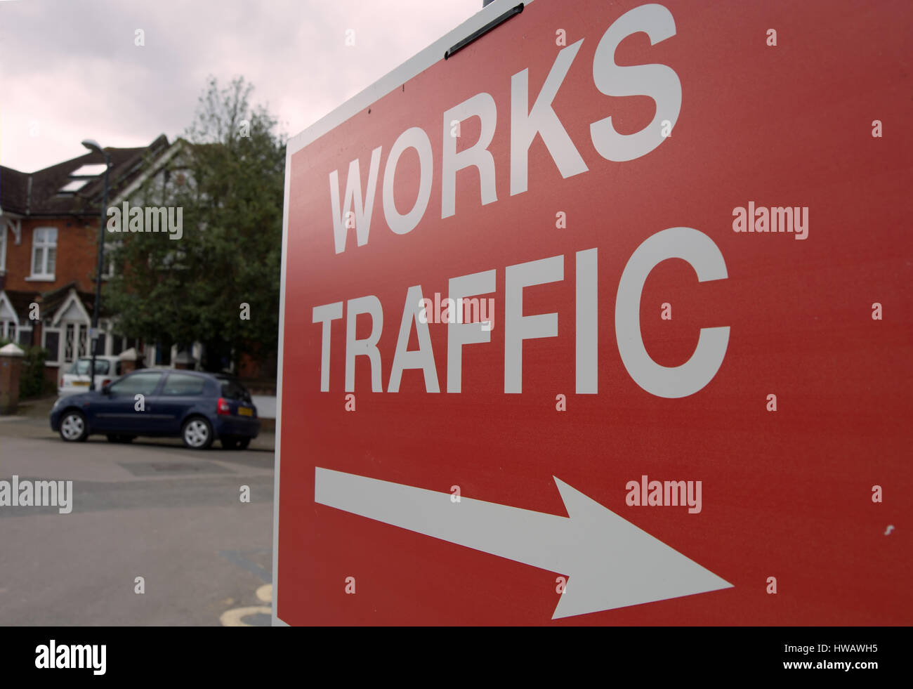 sign for works traffic with right pointing arrow Stock Photo - Alamy