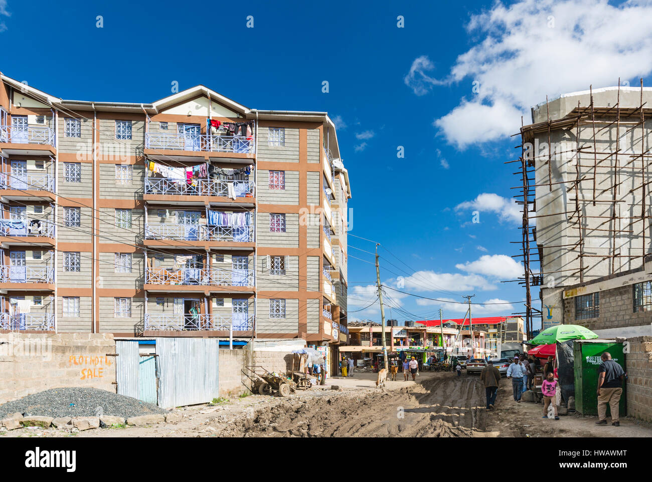 NAIROBI - DECEMBER 21: Tassia village center with muddy streets in the ...