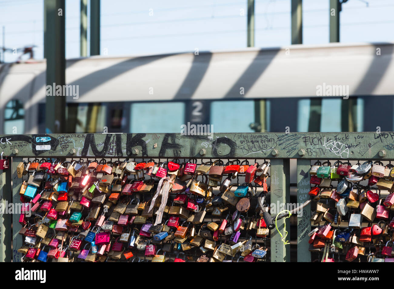 COLOGNE - MAY 14: Love padlocks attached to every possible spot on the ...