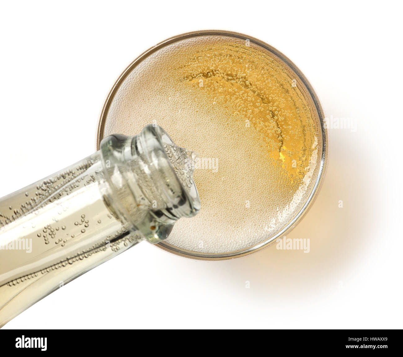 champagne pouring into glass, top view Stock Photo - Alamy