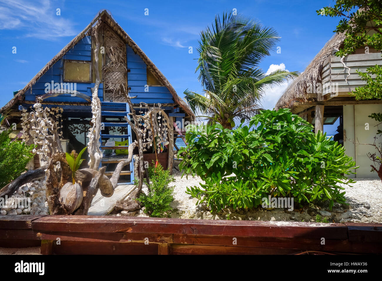 Traditional tropical hut the beach in Moorea Island. French Polynesia ...