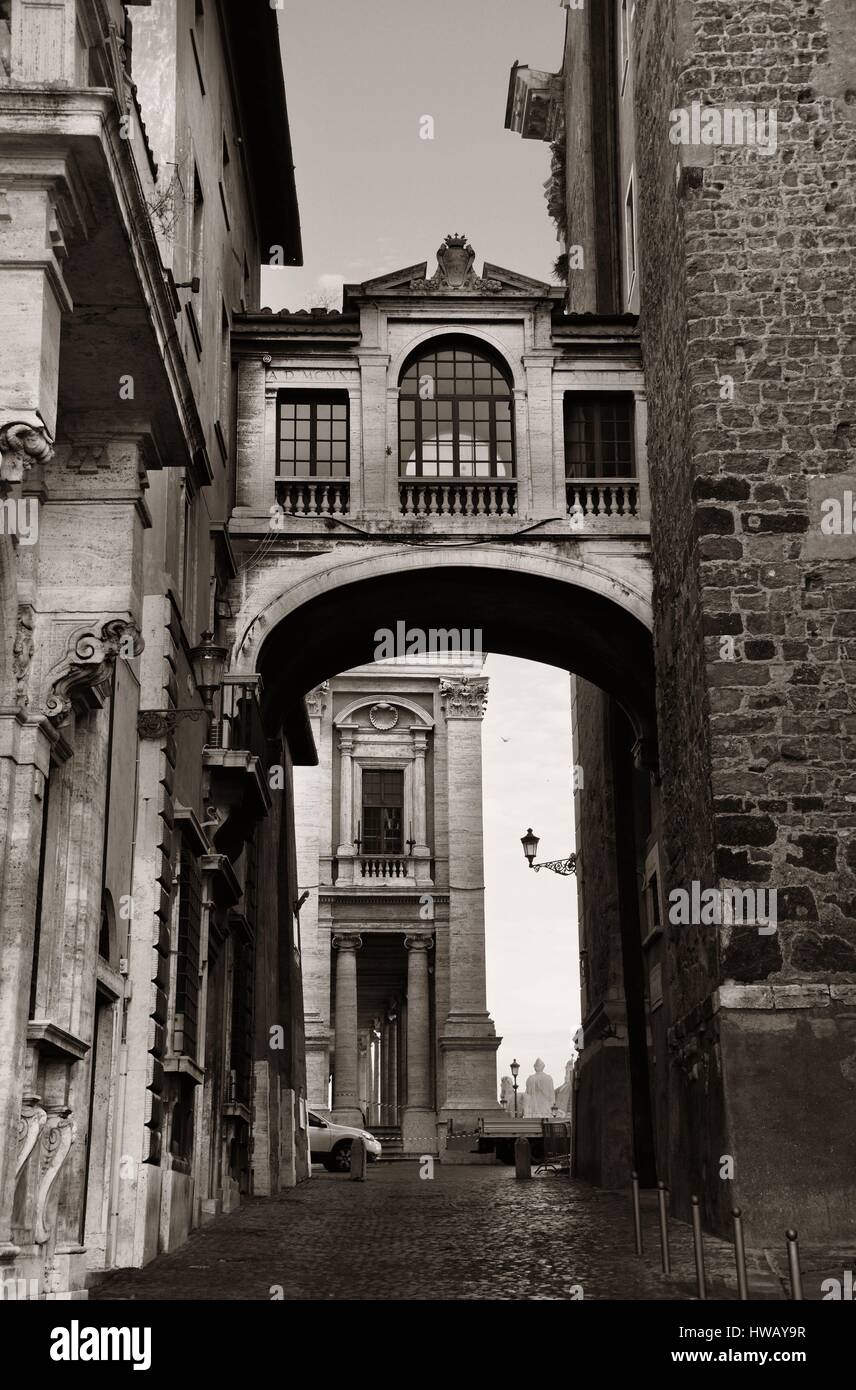 Street view with archway near city hall in Rome, Italy Stock Photo - Alamy