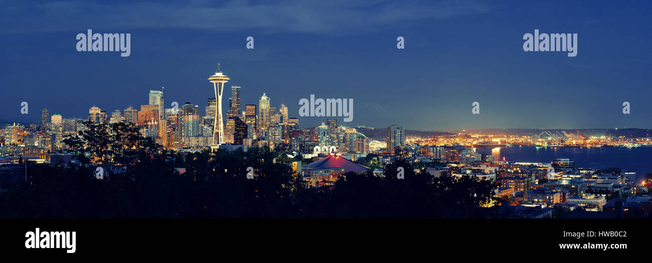 Seattle city skyline at night with urban office buildings viewed from ...