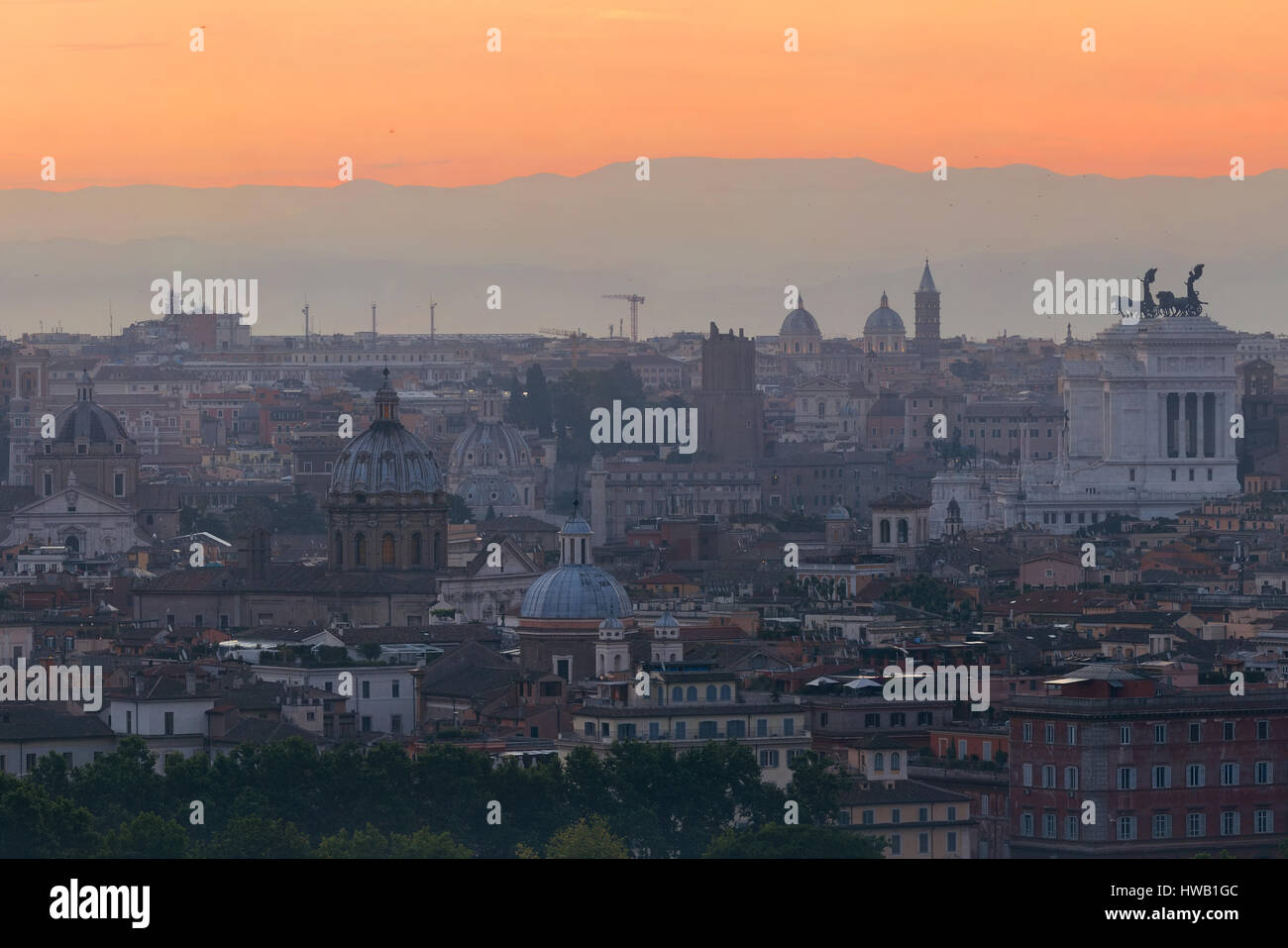 Rome rooftop view with ancient architecture in Italy before sunrise ...