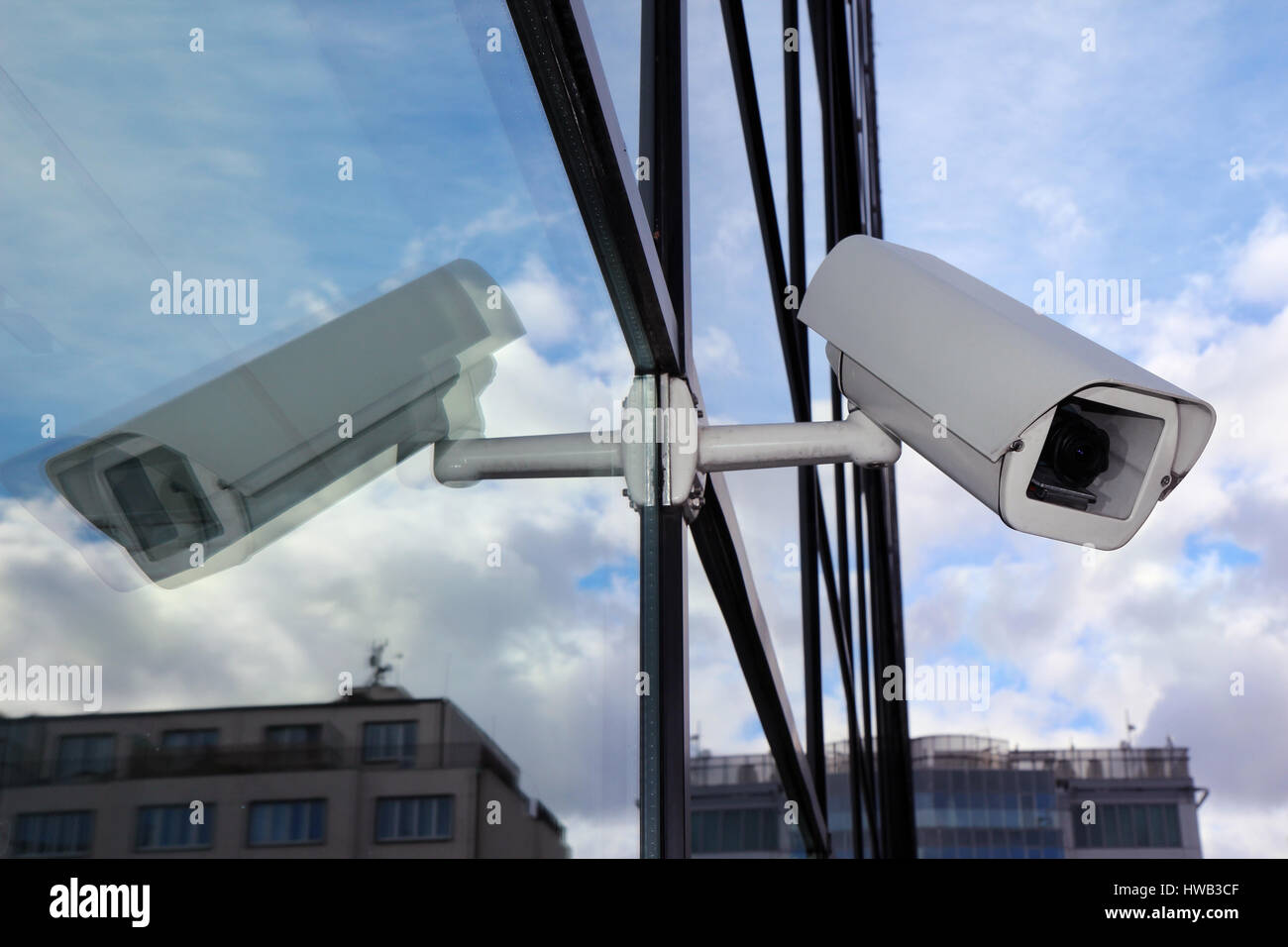 Surveillance camera on glass facade hi-res stock photography and images ...