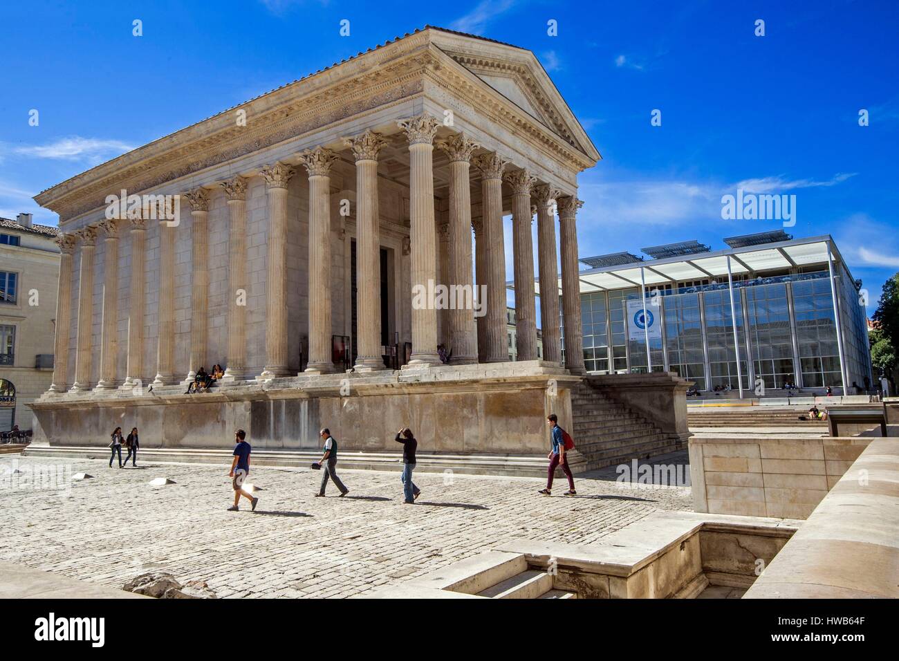 France, Gard, Nimes, the ancient roman temple La Maison Carrée is a ...