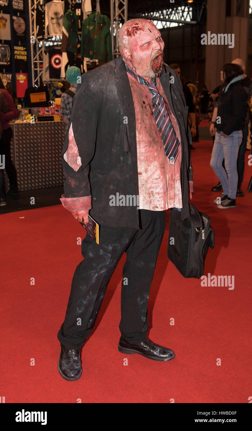 Film and comic fans dressed in the costumes of their favourite ...