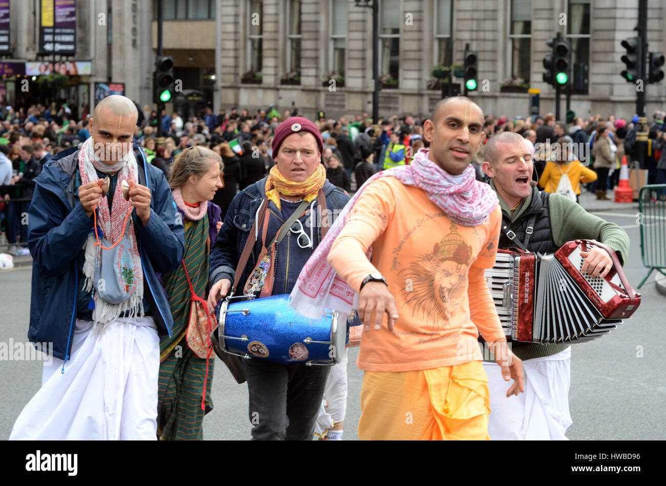 London, UK. 19th March, 2017. Hare Krishna followers make their way ...