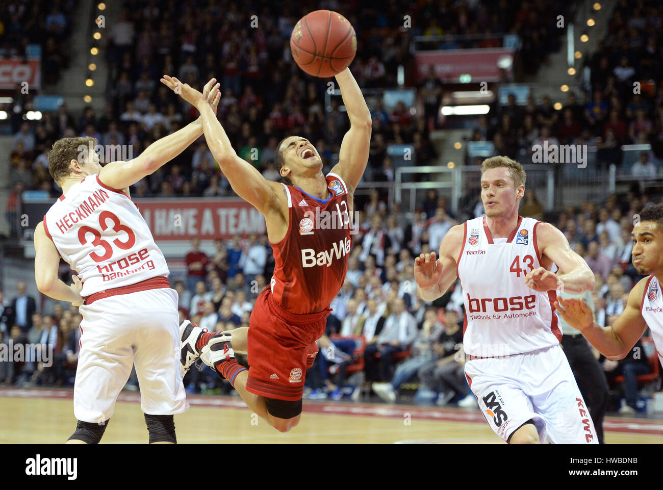 Munich, Germany. 19th Mar, 2017. Bayern's Nick Johnson (M) and Patrick ...