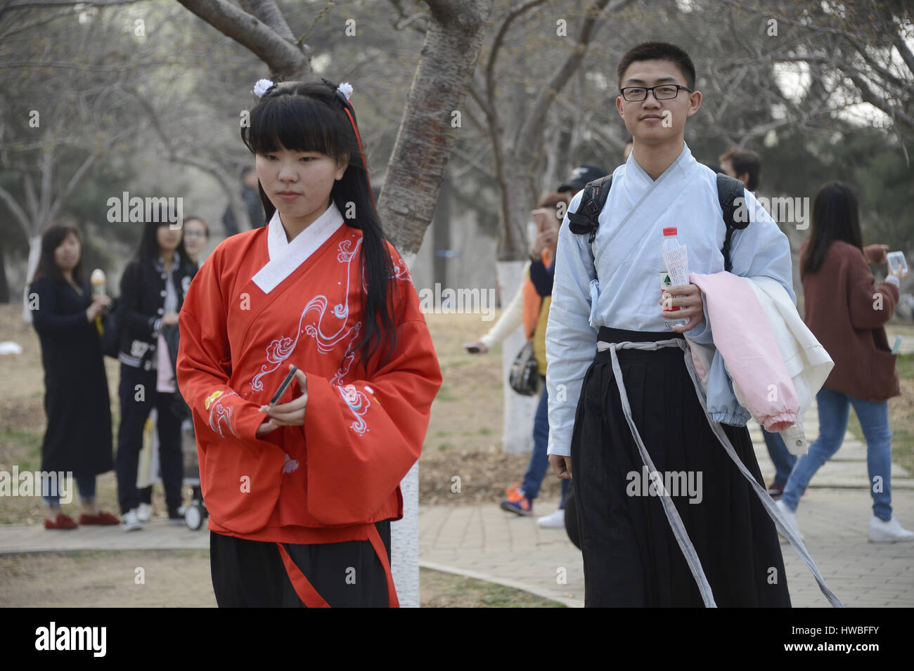 Beijing, China. 19th Mar, 2017. A girl wearing Chinese traditional ...