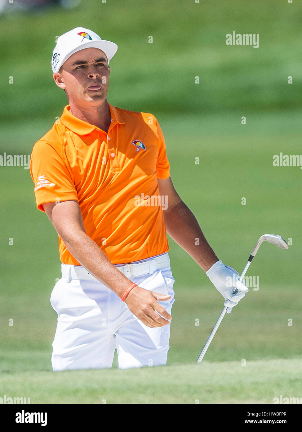 Orlando, FL, USA. 19th Mar, 2017. Rickie Fowler watches his ball from ...