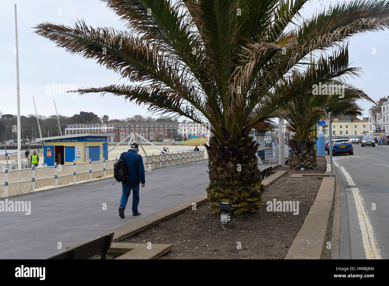 Weymouth, Dorset, UK. 20th Mar, 2017. UK Weather. Walker on the ...