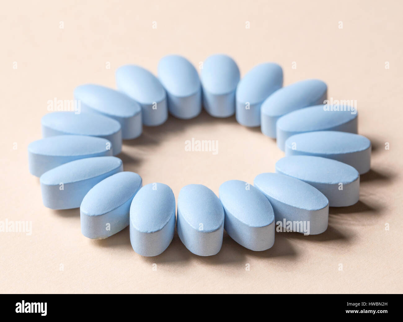 blue medicine pills on beige background, selective focus Stock Photo ...