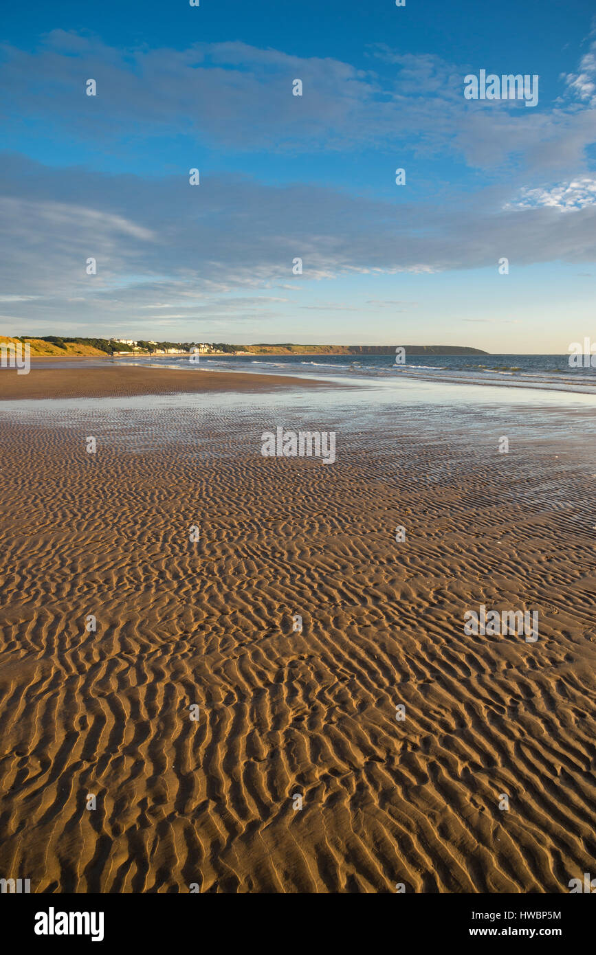 Ripples in the sand at low tide on the beach at Filey Bay, North ...