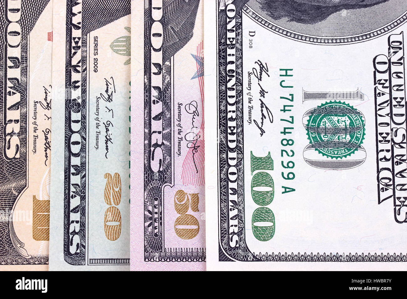 Abstract dollar bills of different denominations background Stock Photo ...
