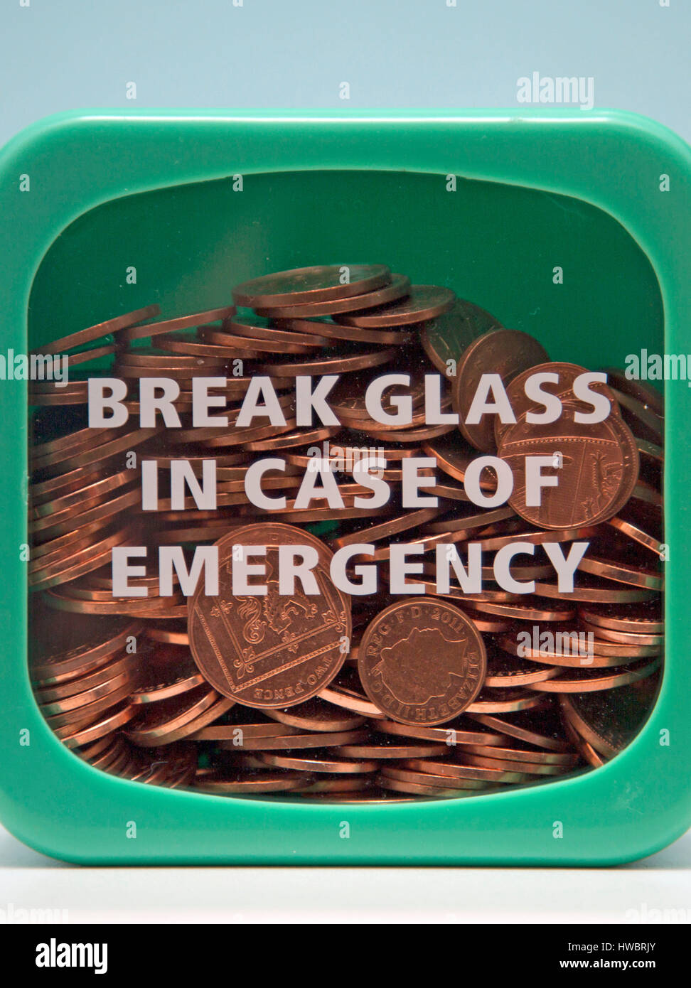 Coins in cash box, London Stock Photo - Alamy