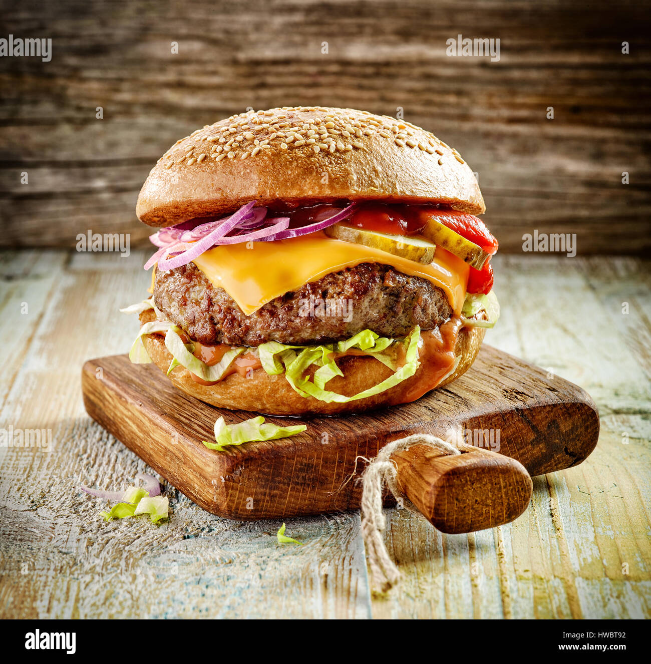 Cutting burger hi-res stock photography and images - Alamy