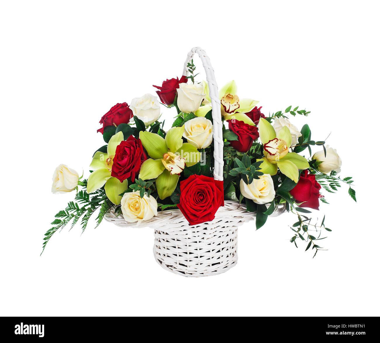 Basket of red and white roses and orchids isolated on white background ...