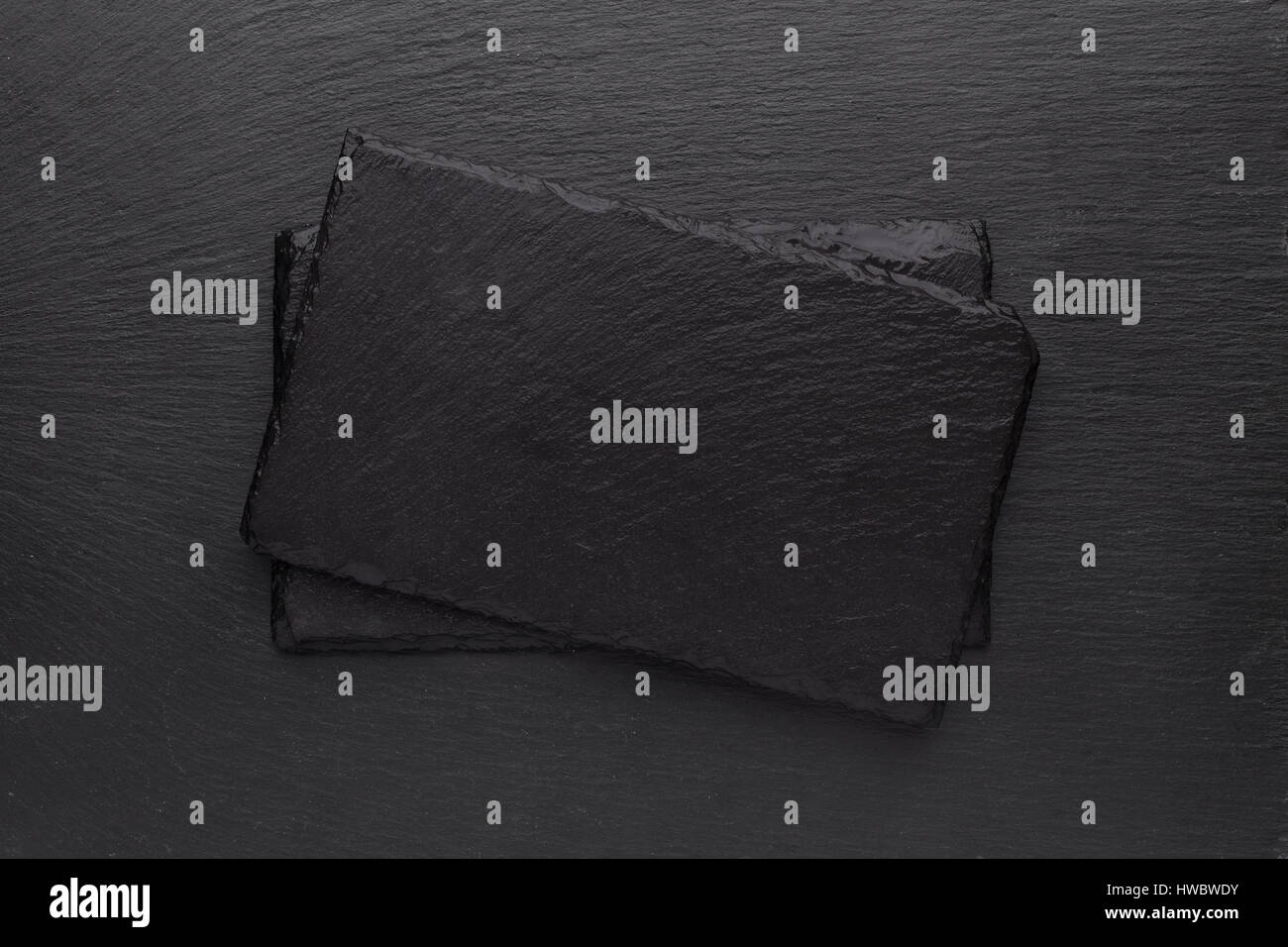 Two black slate boards on dark textured background Stock Photo - Alamy