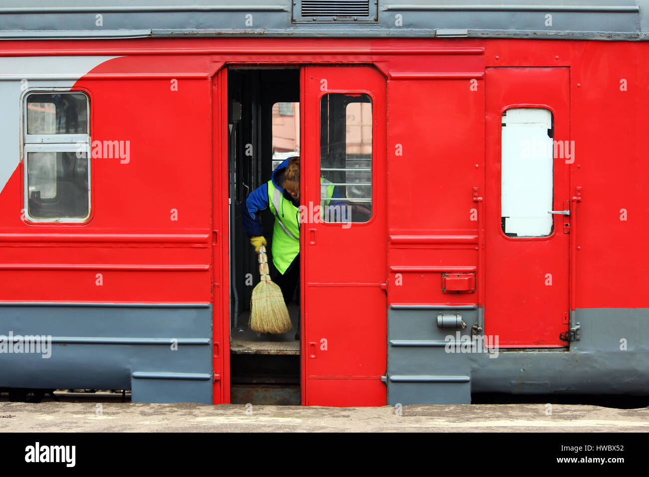 Cleaning of the railway car in the train before the departure of the ...