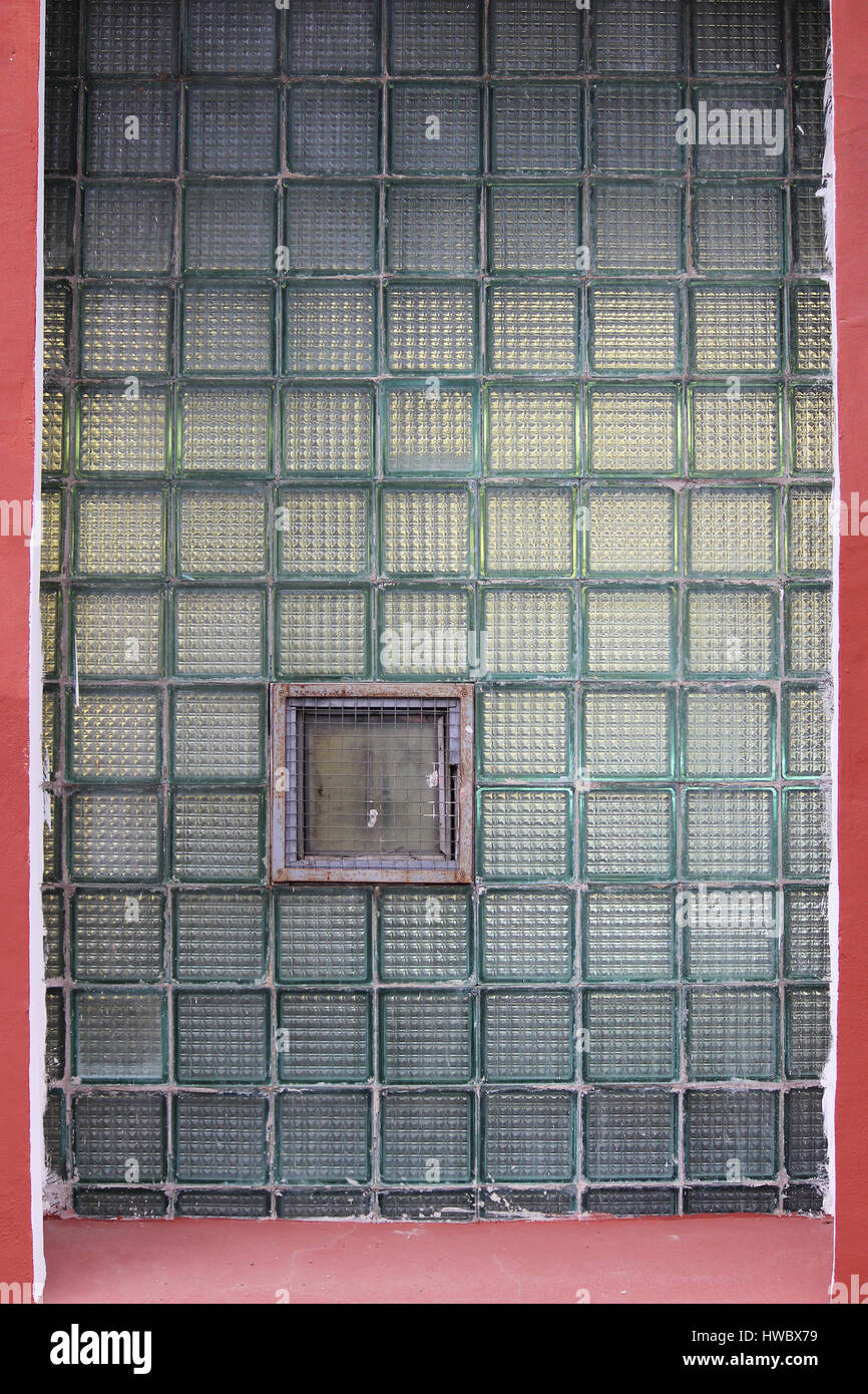 A window in a glass wall made of thick-walled batch cells Stock Photo ...