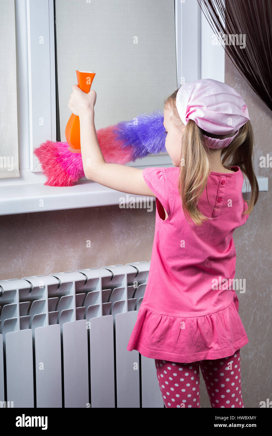 Girl with feather duster hi-res stock photography and images - Alamy